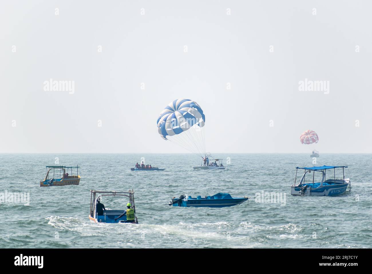 Calangute, Goa, India - January 2023: Speed boats, paraglides and other ...
