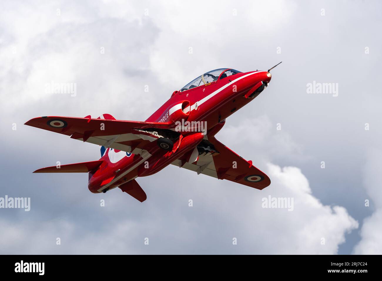 RAF Red Arrows BAe Hawk jet plane taking off from London Southend Airport, Essex, UK. Using the ...