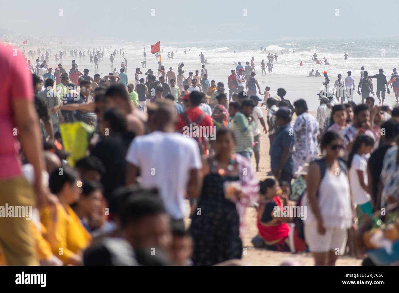 Calangute, Goa, India - January 2023: A large crowd of Indian tourists ...