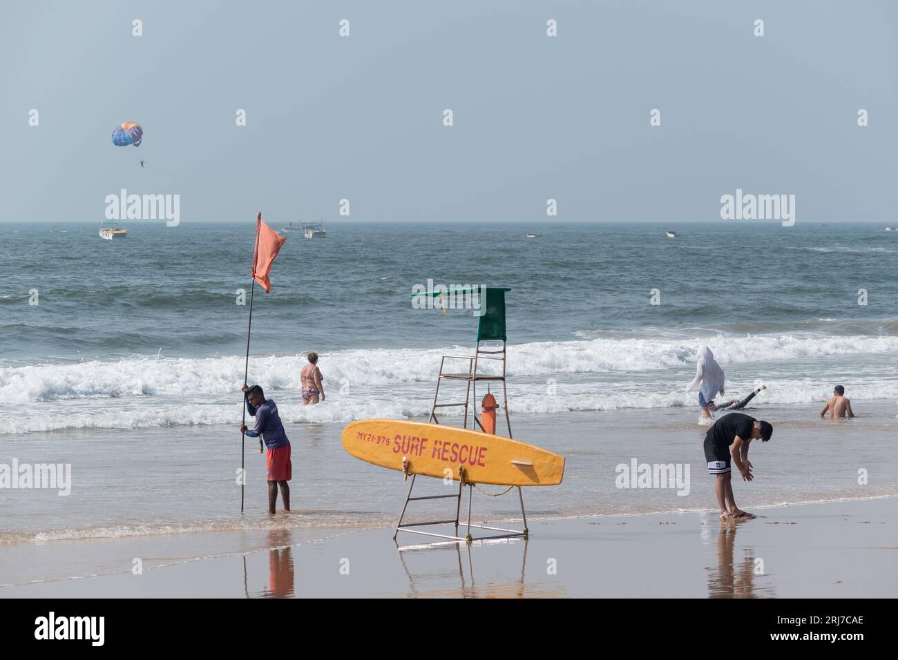 Calangute, Goa, India - January 2023: Lifeguards putting up warning ...