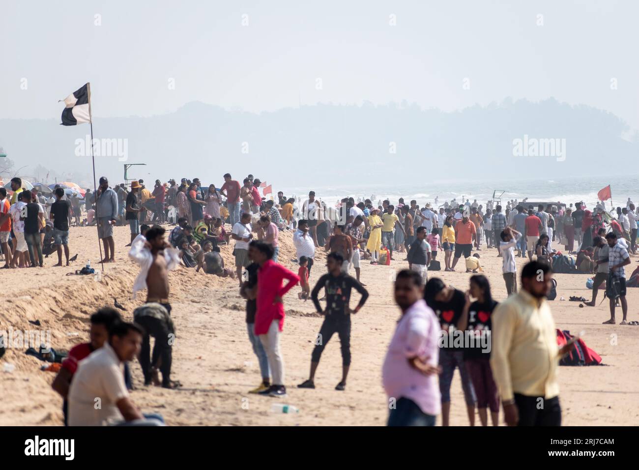 Calangute, Goa, India - January 2023: The crowded beach full of Indian ...