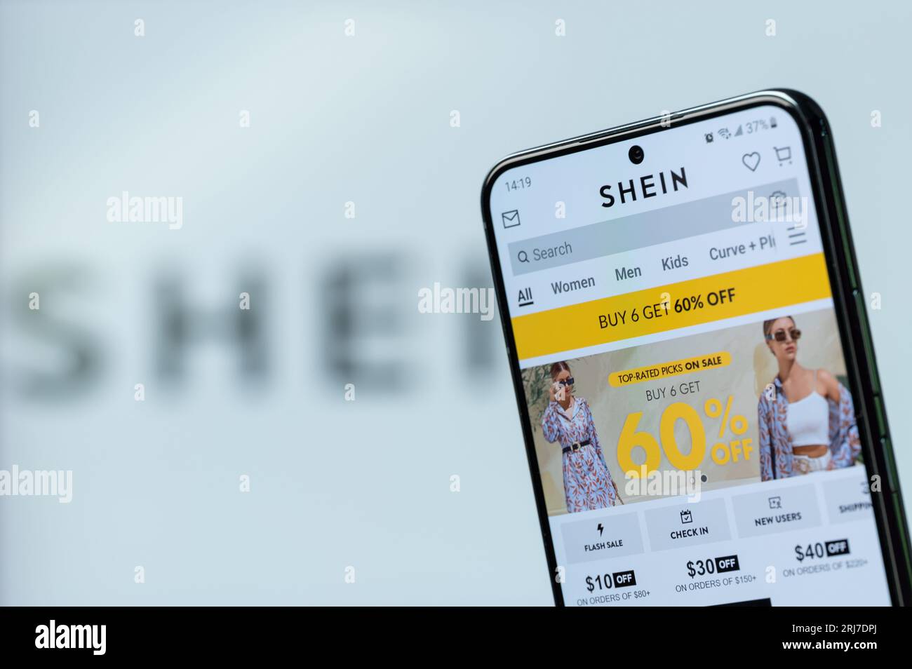 New York, USA - August 20, 2023: Buying promotion online with shein ...