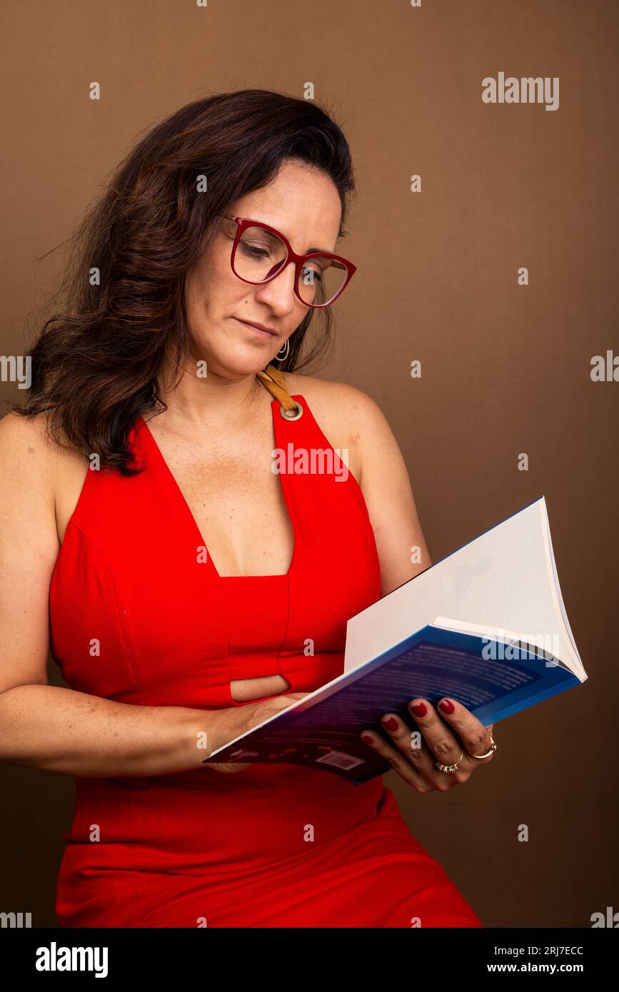 Coaching woman, concentrated reading motivational book. Nonviolent ...