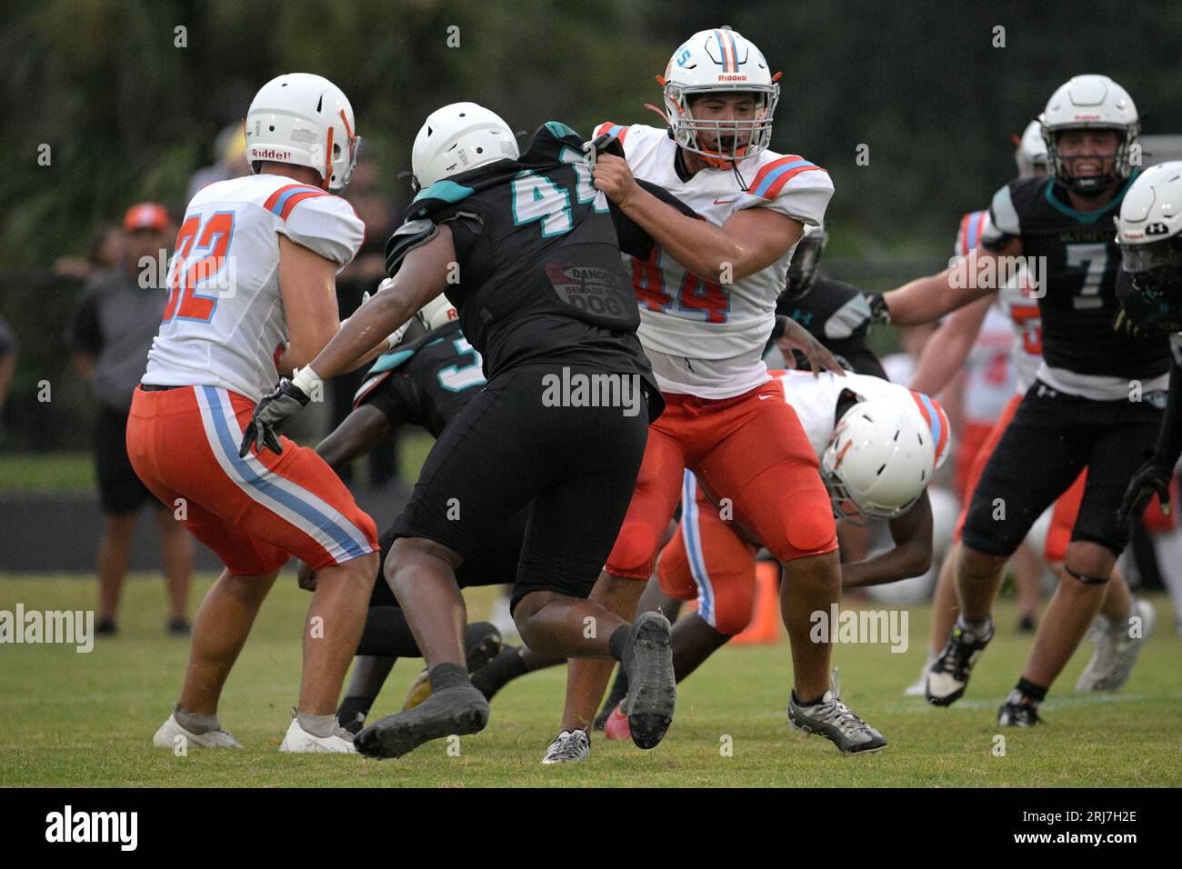 Boone's Jadon Frick (44) works against Olympia's Bennett Seays (44 ...