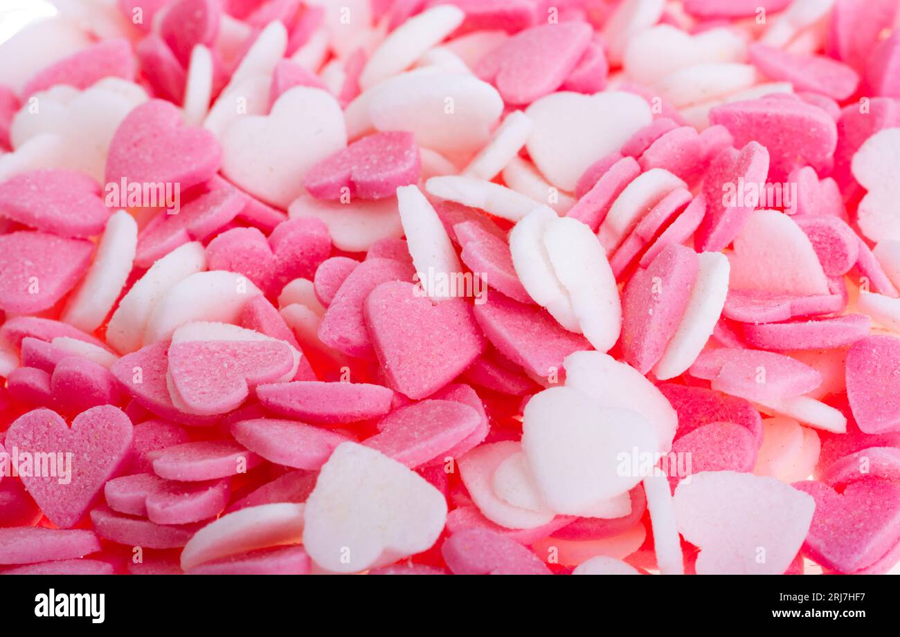 sugar small hearts isolated on white background Stock Photo - Alamy