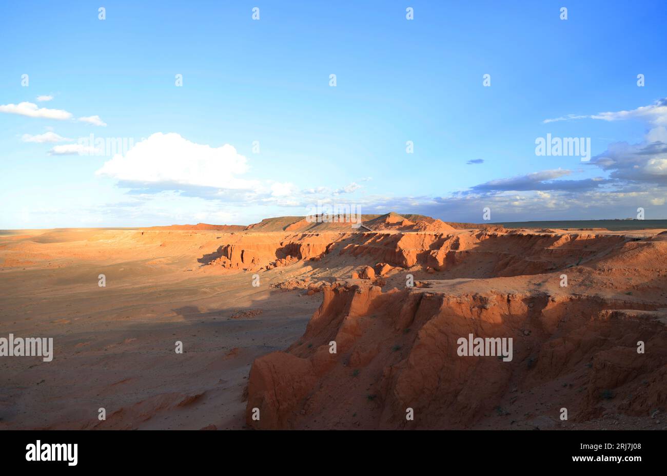The rock formations of Bayanzag flaming cliff at sunset, Mongolia Stock ...