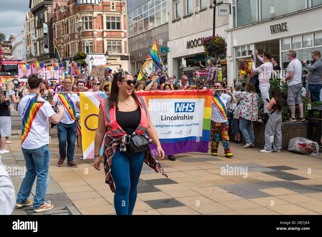 Lincoln Pride Parade helper enjoying the day, High Street, Lincoln City ...