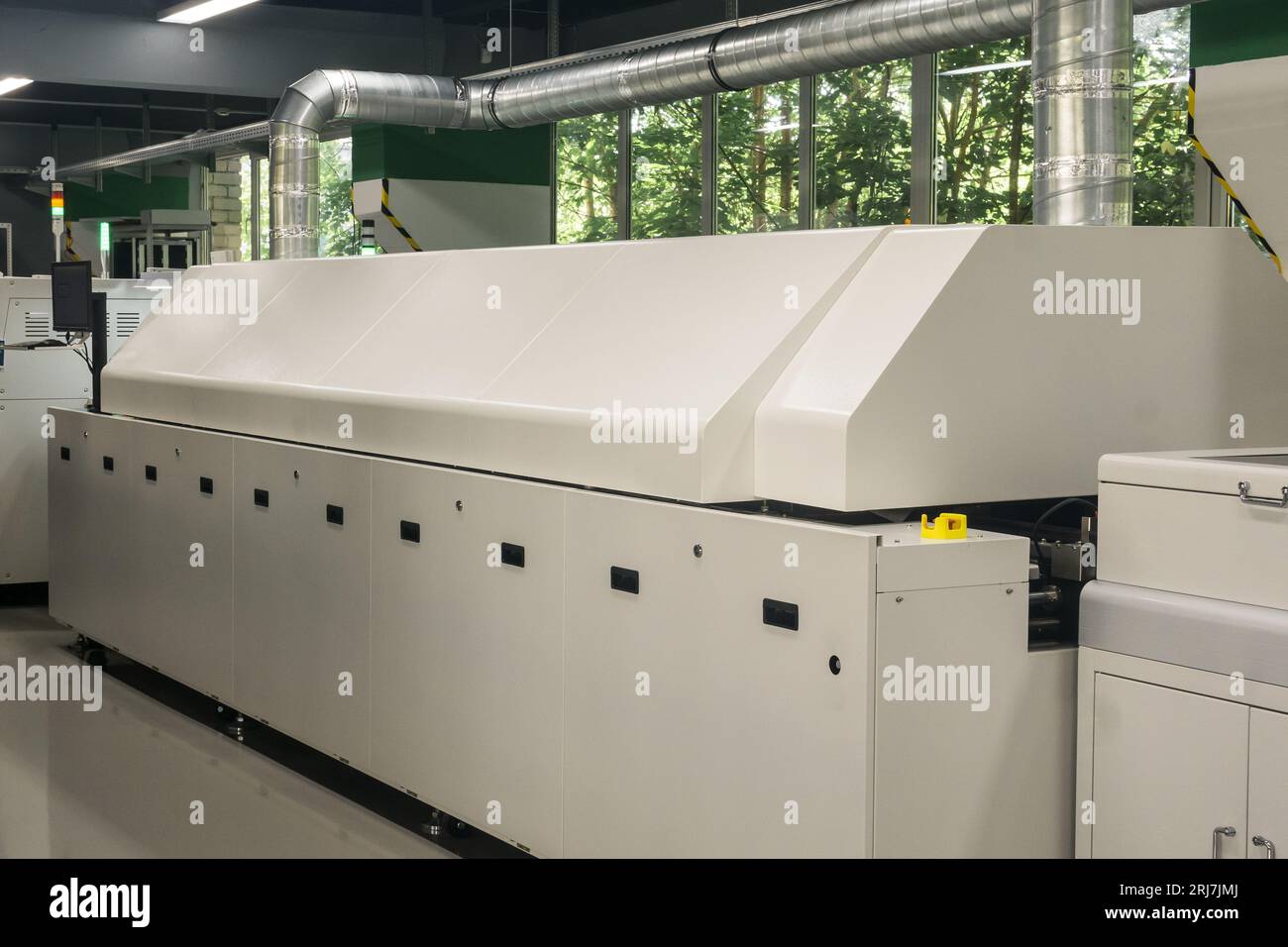 production line for printed circuit board, automatic chip mounter Stock ...