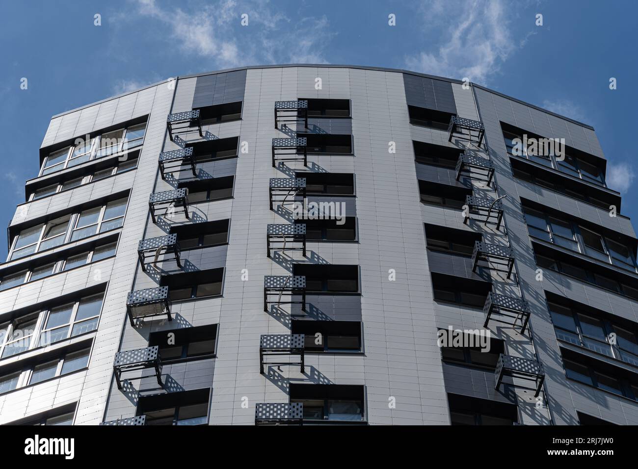 New building facade in housing complex. Modern style in architecture ...