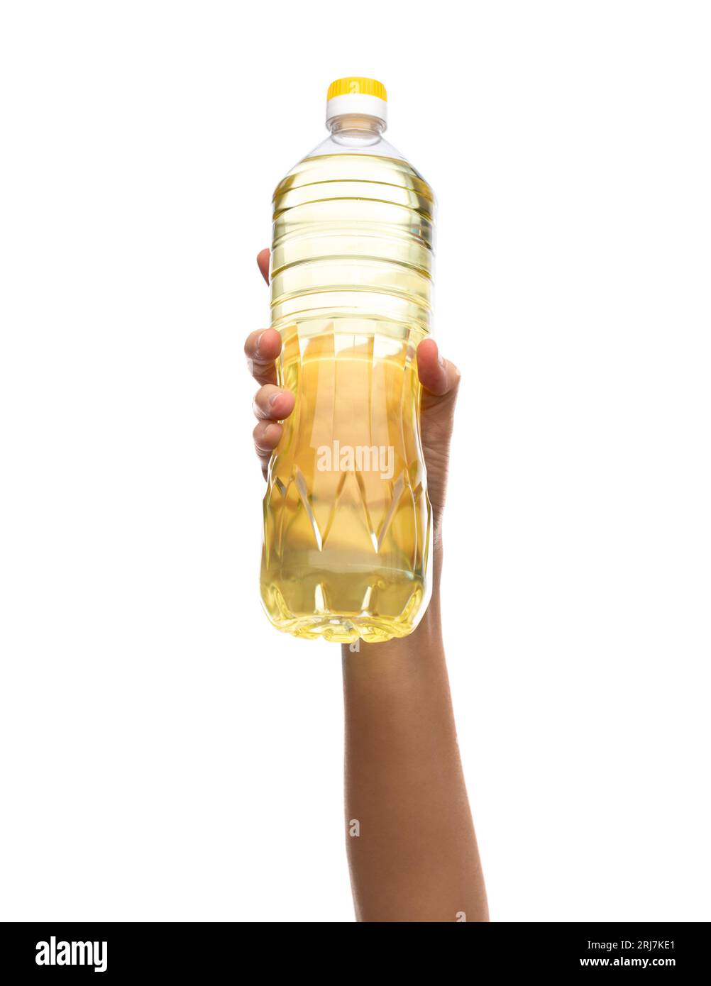hand holding cooking oil in plastic bottle Stock Photo - Alamy