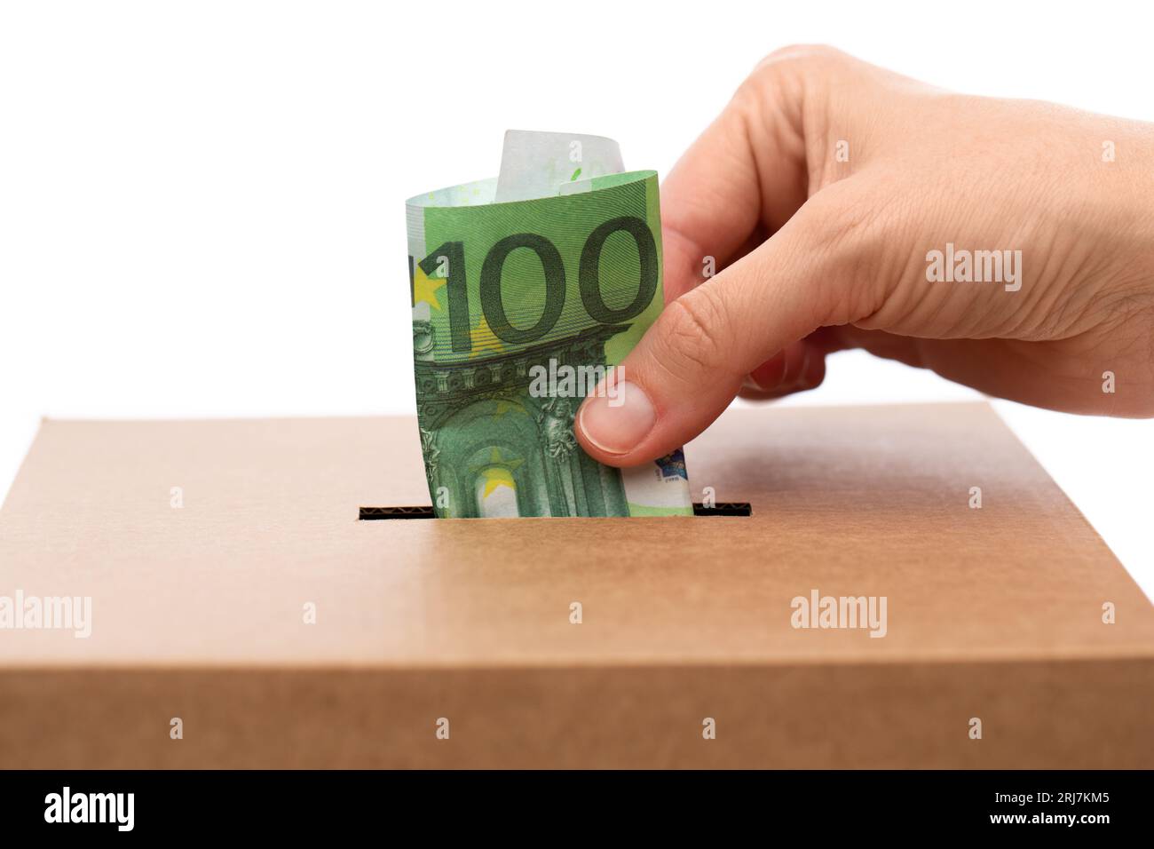 hand putting euro cash money into donation box Stock Photo - Alamy