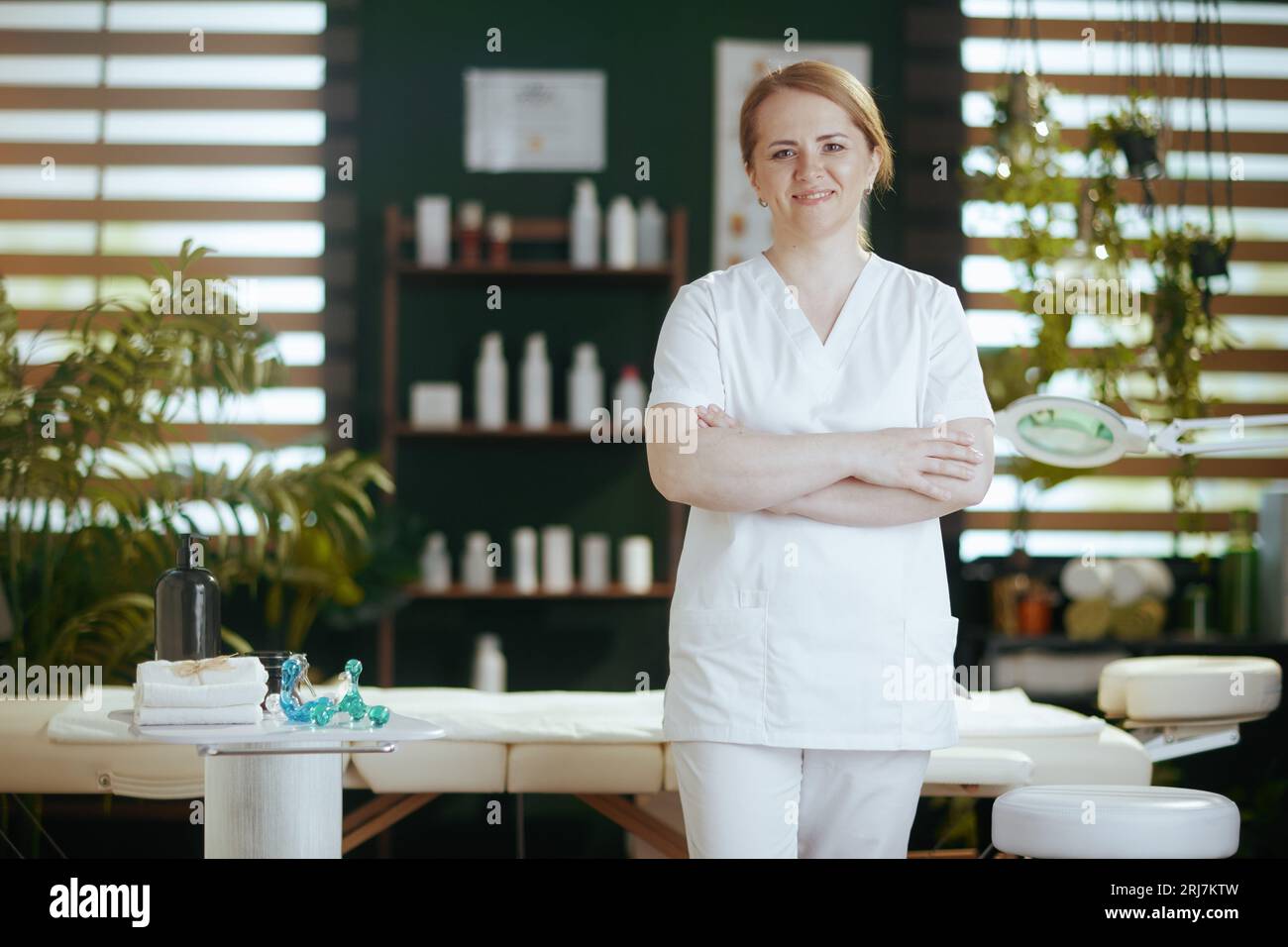 Healthcare Time Portrait Of Happy Female Massage Therapist In Massage
