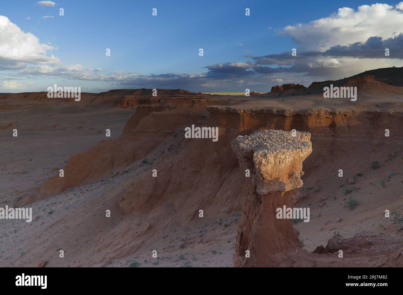 The rock formations of Bayanzag flaming cliff at sunset, Mongolia Stock ...