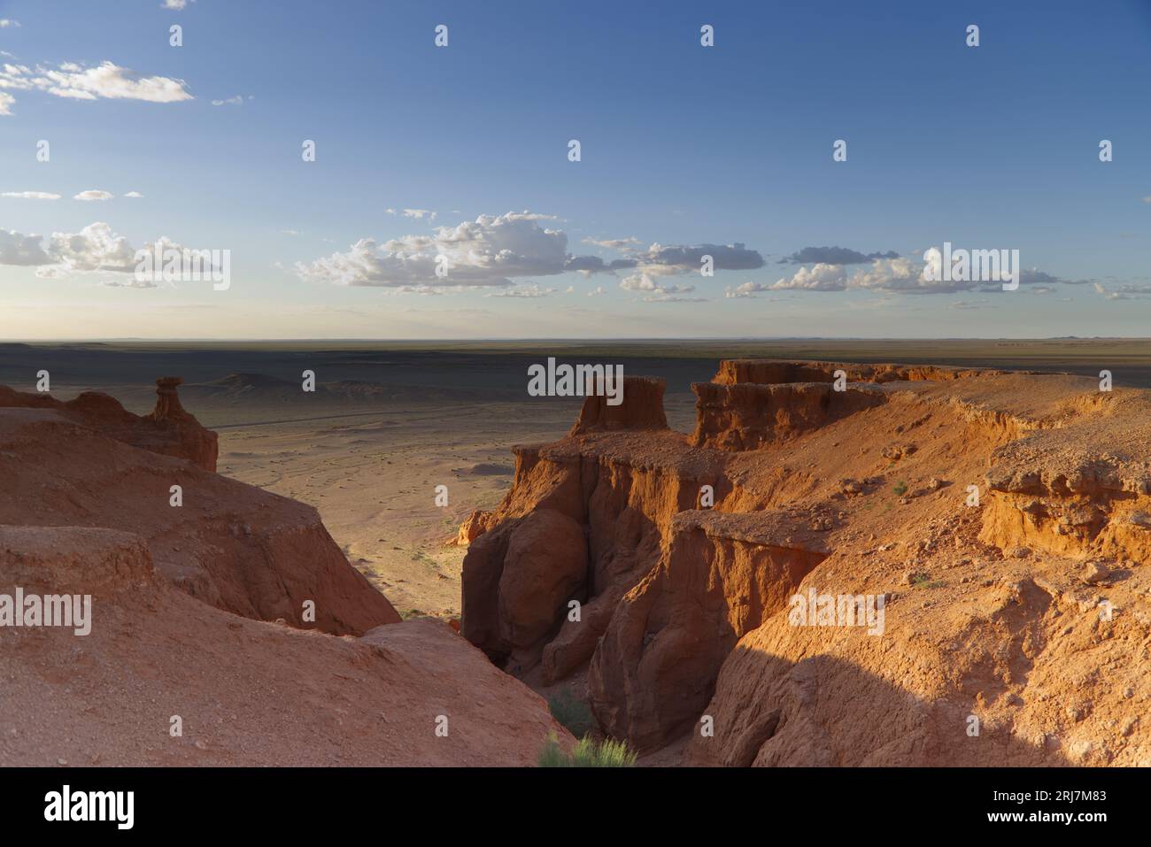 The rock formations of Bayanzag flaming cliff at sunset, Mongolia Stock ...