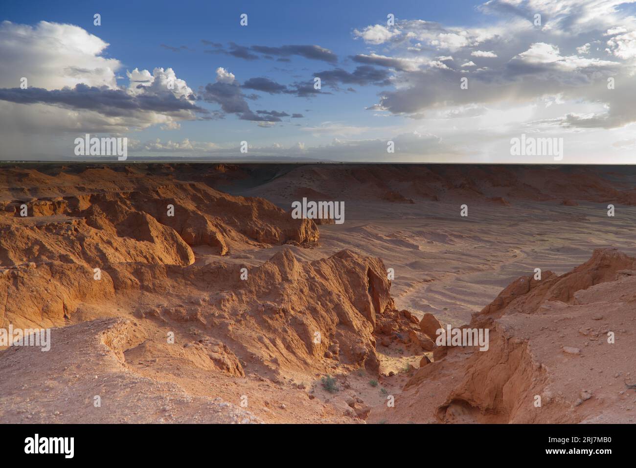 The rock formations of Bayanzag flaming cliff at sunset, Mongolia Stock ...