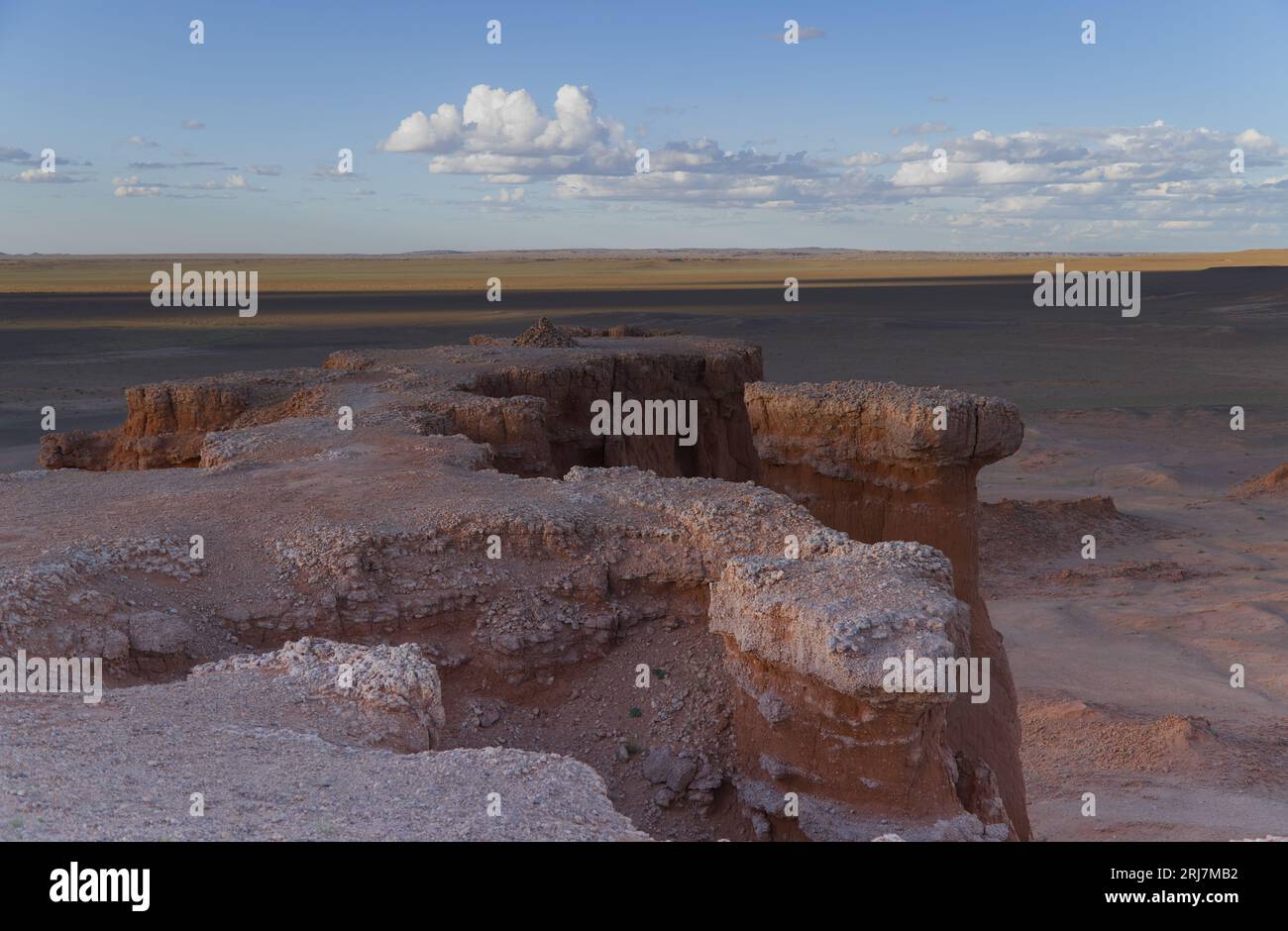The rock formations of Bayanzag flaming cliff at sunset, Mongolia Stock ...