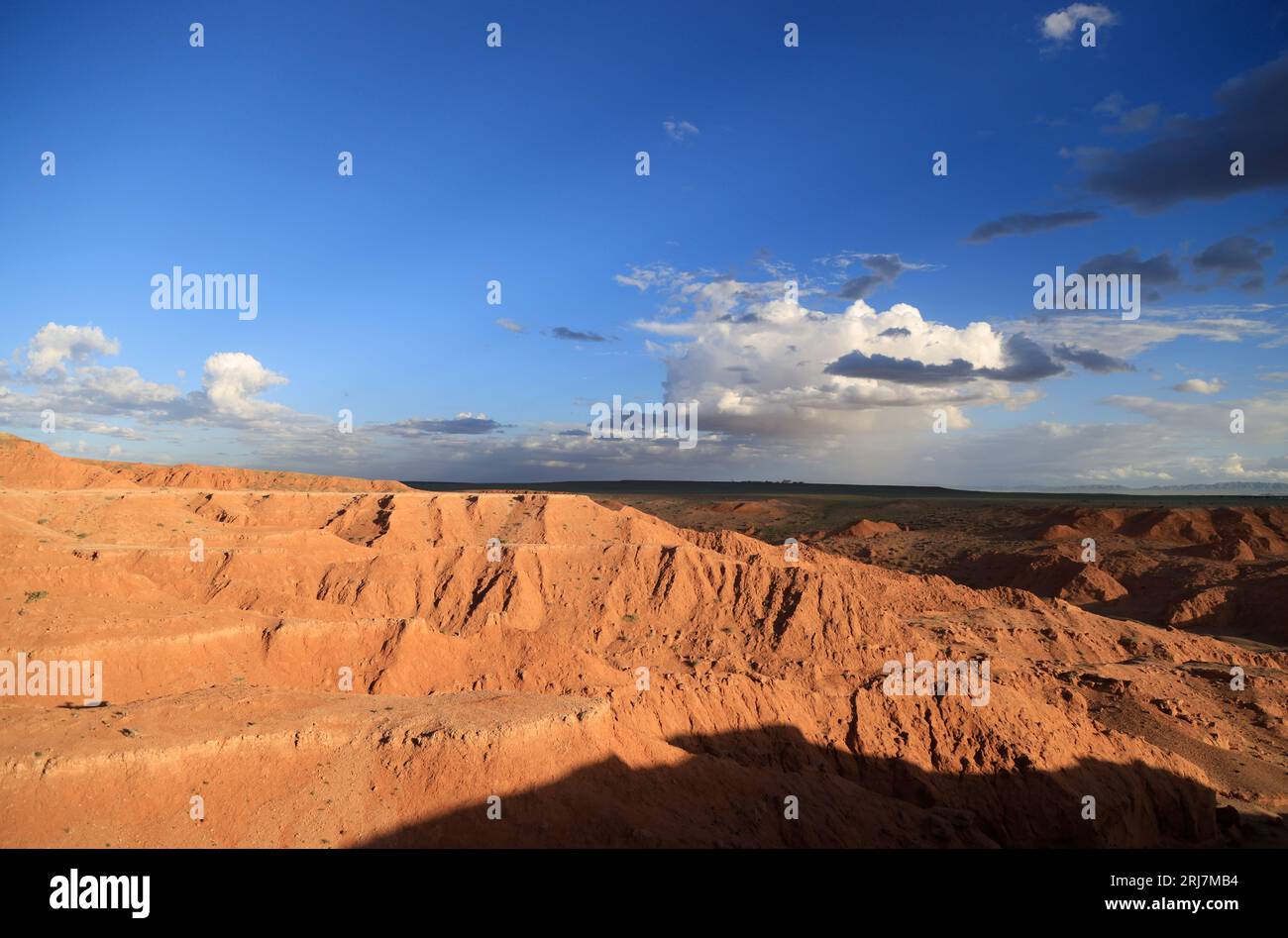 The rock formations of Bayanzag flaming cliff at sunset, Mongolia Stock ...