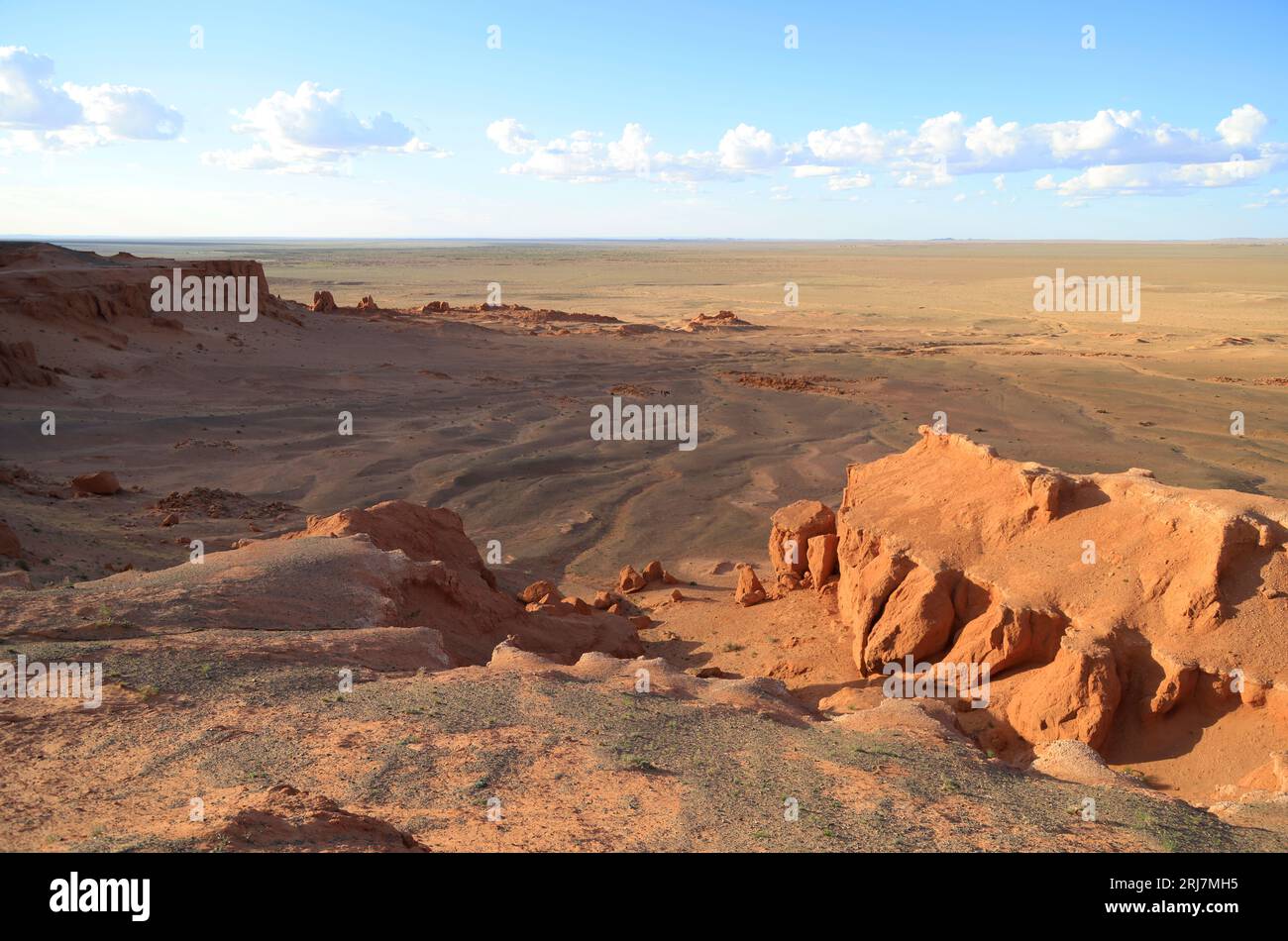 The rock formations of Bayanzag flaming cliff at sunset, Mongolia Stock ...