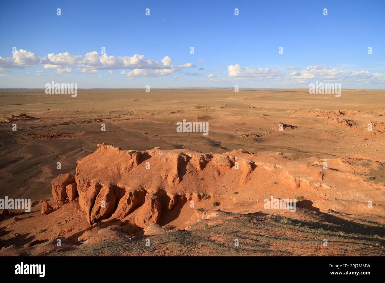 The rock formations of Bayanzag flaming cliff at sunset, Mongolia Stock ...