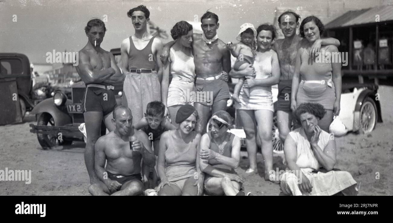 1920s, historical, summertime and a large family gather together for a ...