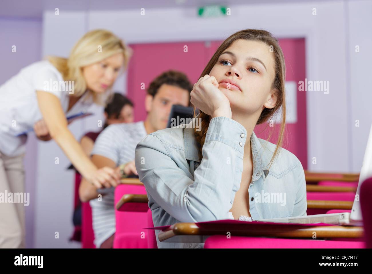 a bored female university student Stock Photo - Alamy