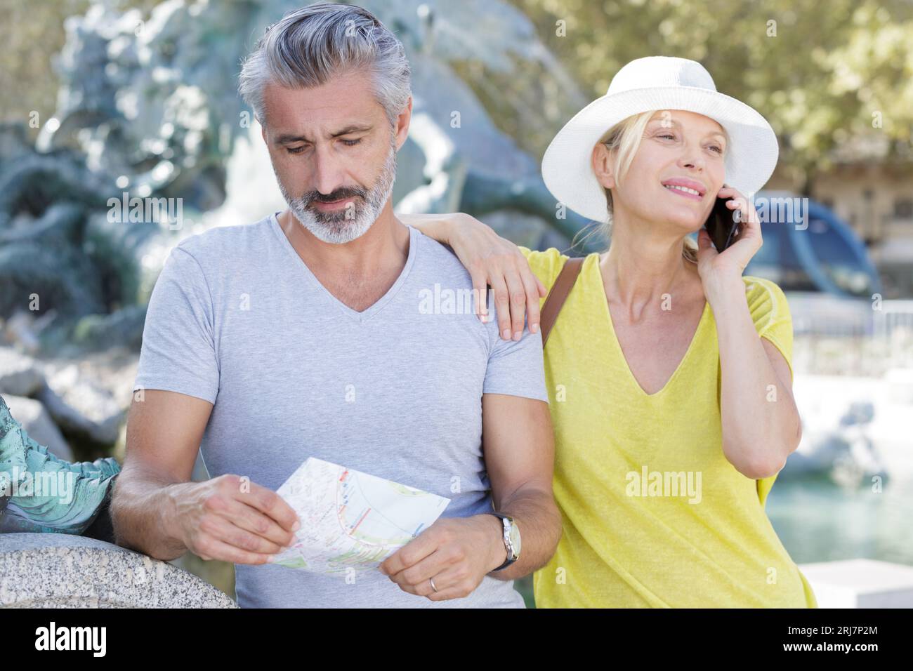 Happy middle aged couple map in hi-res stock photography and images - Alamy
