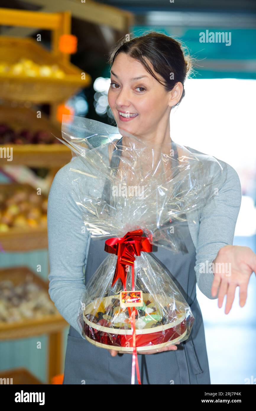 smiling women selling sweet tarts and pastry in coffee-house Stock ...