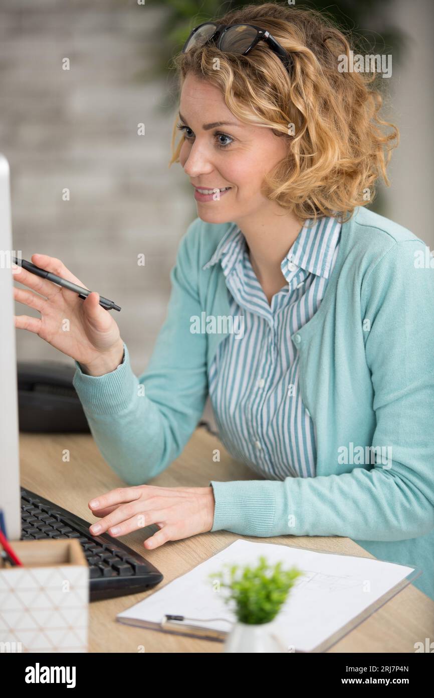 Happy pensive businesswoman planning hi-res stock photography and ...