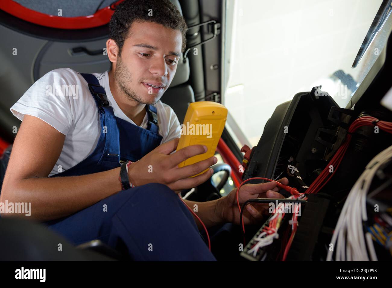 Testing car battery with voltmeter hi-res stock photography and images ...