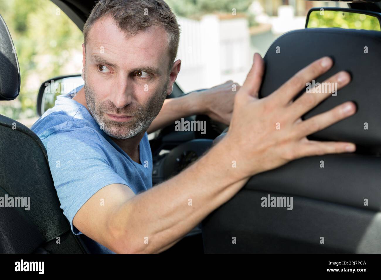 Reverse parking man hi-res stock photography and images - Alamy