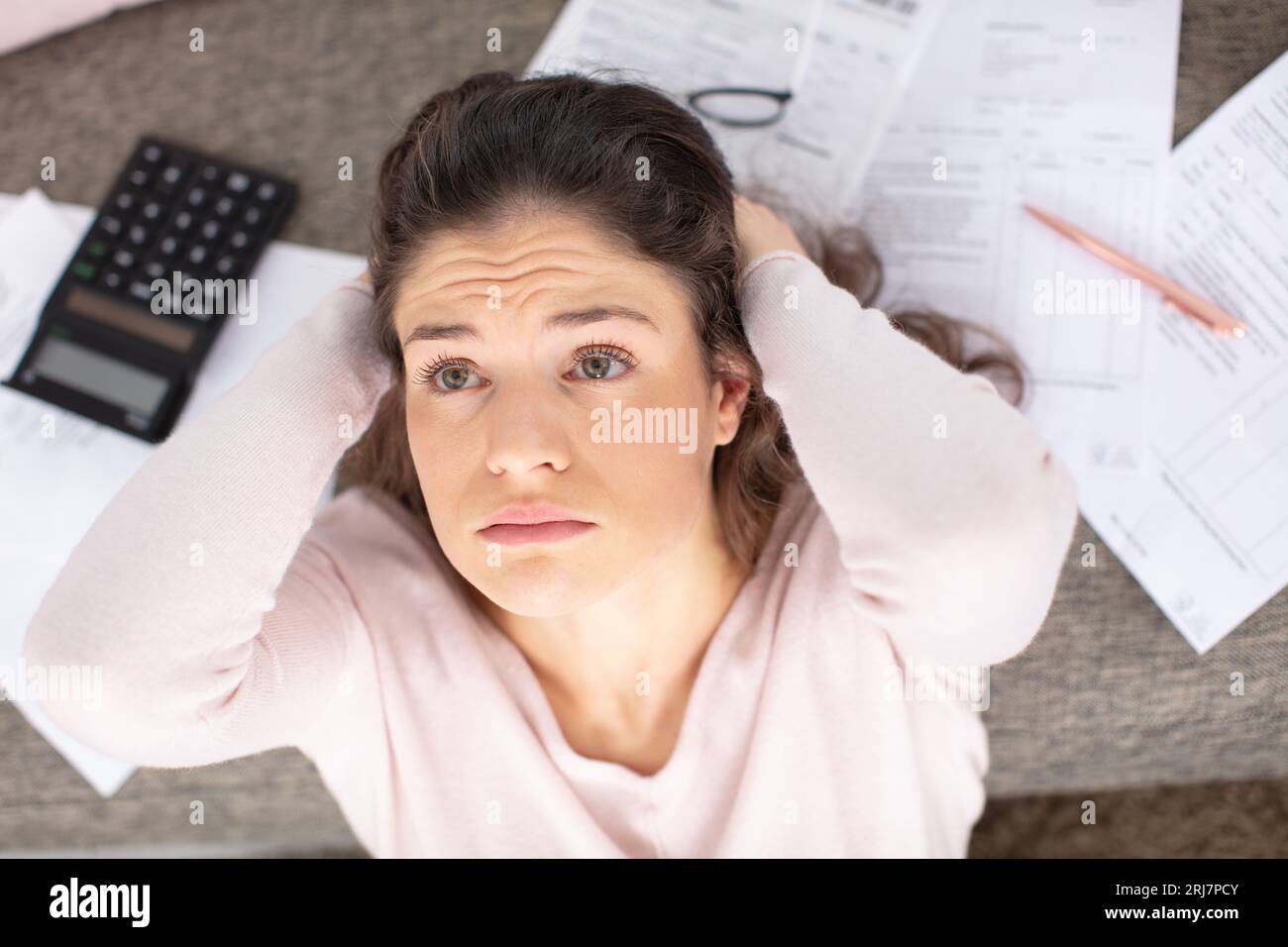 Woman surrounded by paperwork hi-res stock photography and images - Alamy