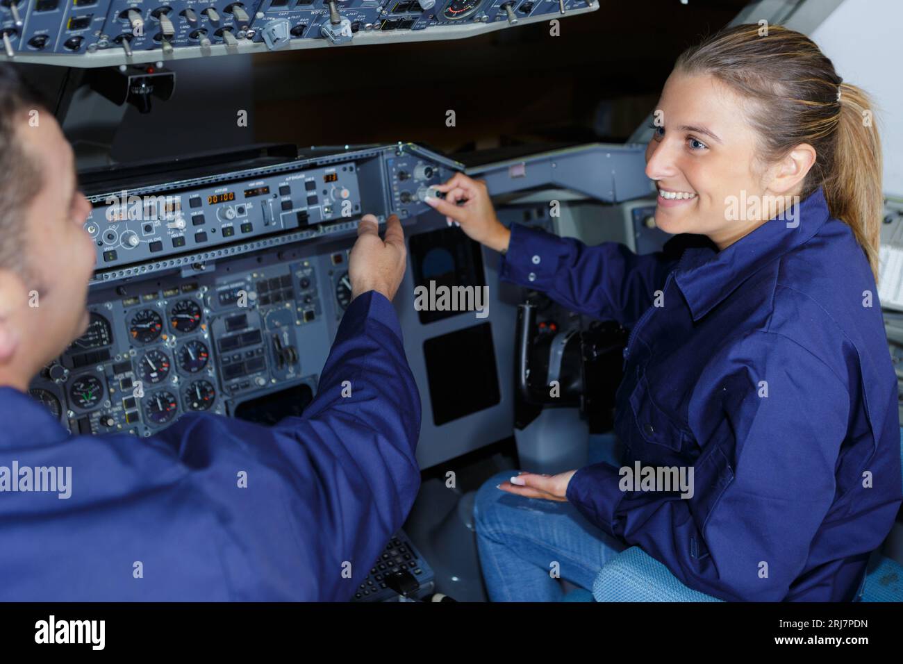 aircraft maintenance engineers in cockpit Stock Photo - Alamy