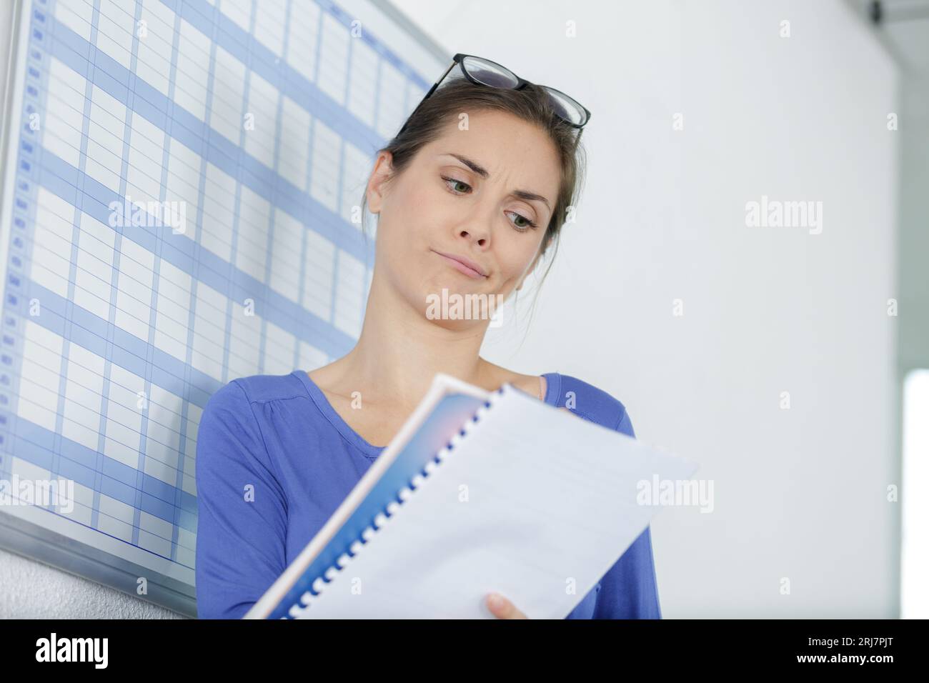 portrait of a confused office worker Stock Photo - Alamy