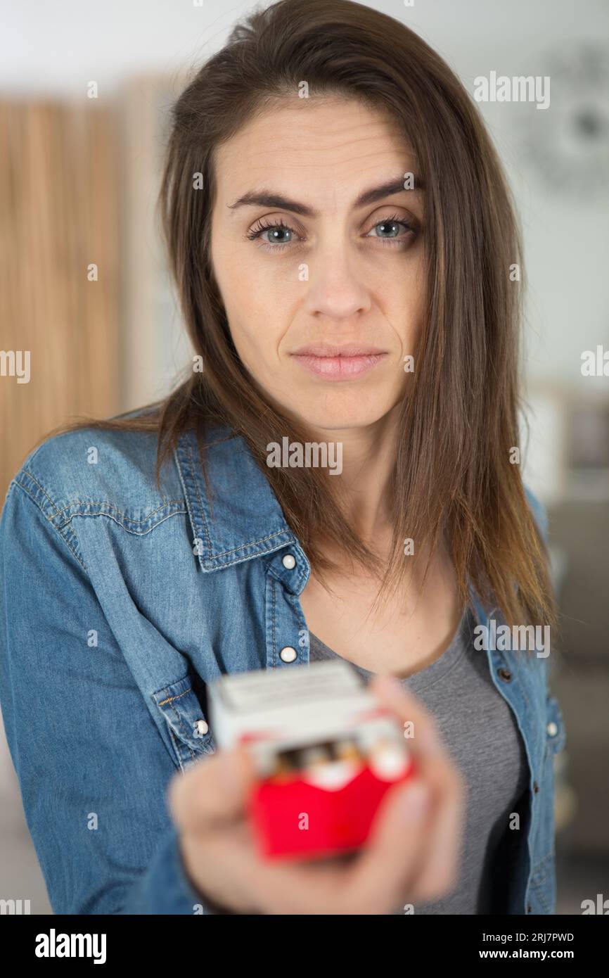 Woman temptation cigarette hi-res stock photography and images - Alamy