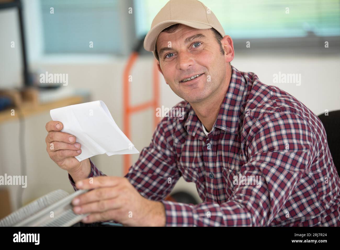 Construction worker reading manual hi-res stock photography and images ...