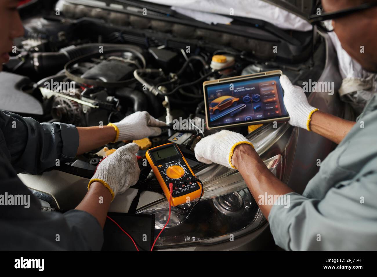 Car mechanics hands checking hi-res stock photography and images - Alamy