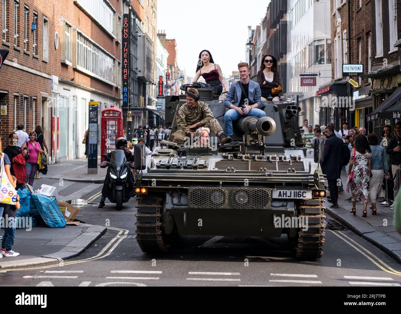 Tank being driven down Dean Street, in Soho, Central London Stock Photo ...