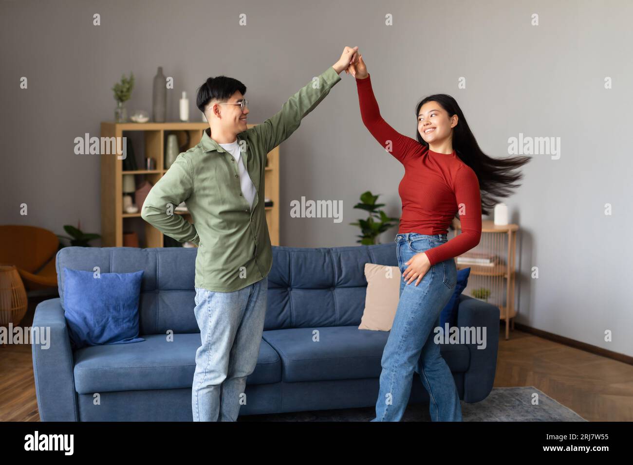 Happy korean couple dancing having hi-res stock photography and images ...