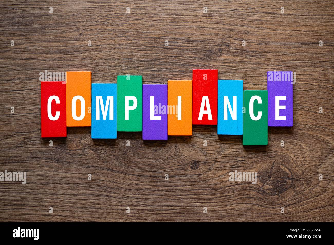 Compliance - word concept on building blocks, text Stock Photo - Alamy