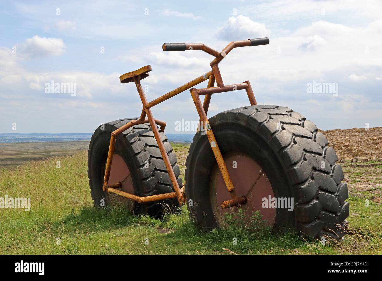 Sculpture of an oversize bicycle Stock Photo - Alamy