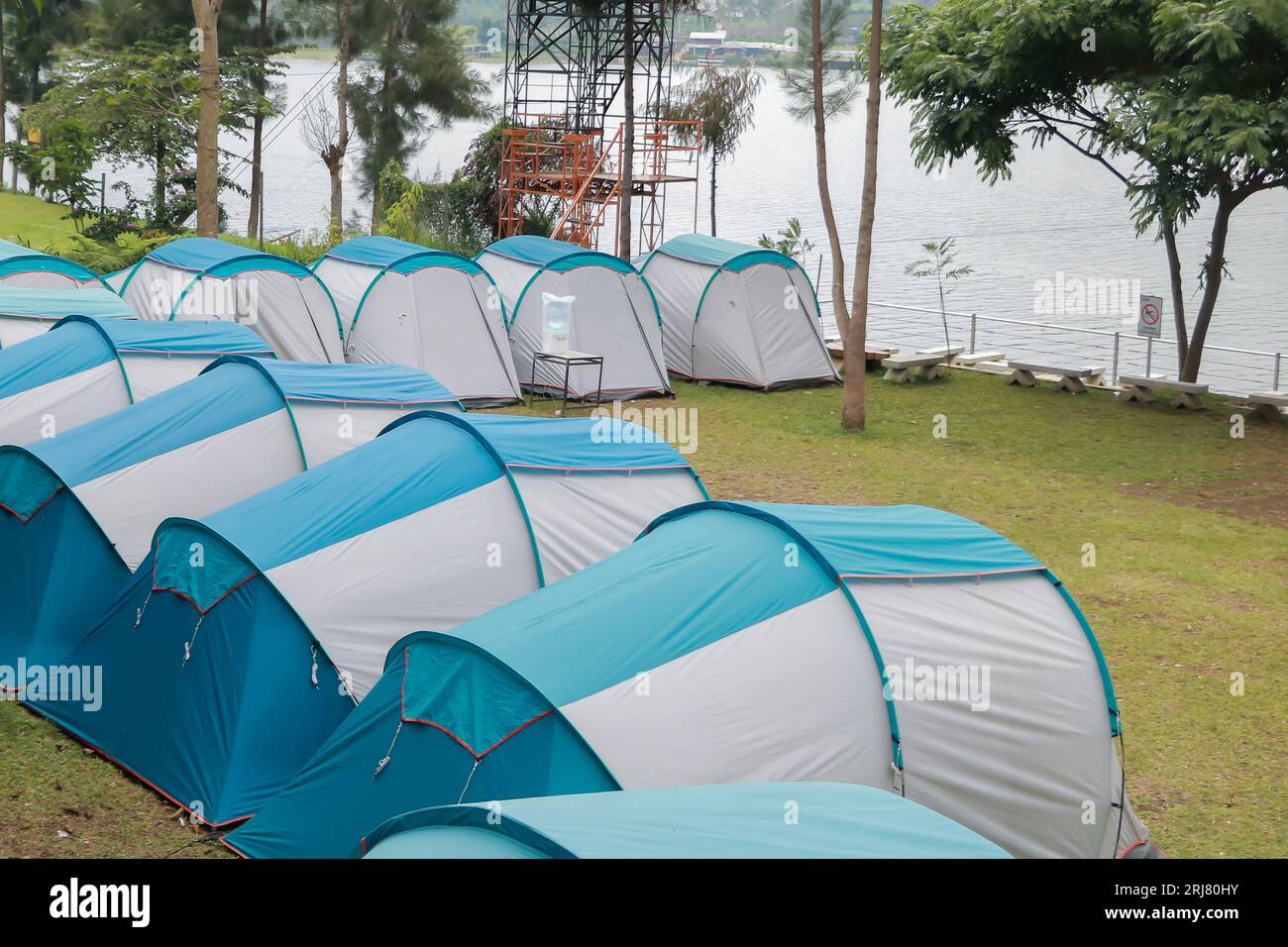 Camping and tent in the riverside. Panoramic landscape. Natural area ...