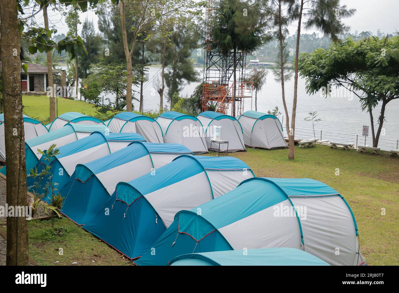 Camping and tent in the riverside. Panoramic landscape. Natural area ...