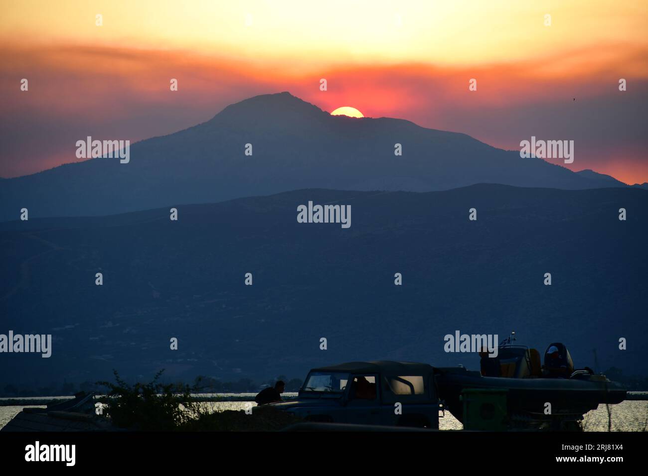 GREECE- RED SUNSET AFTER FIRE IN PELOPONNESE Stock Photo - Alamy