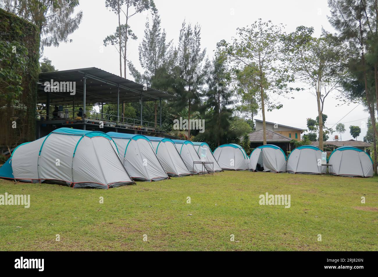 Camping and tent in the riverside. Panoramic landscape. Natural area ...