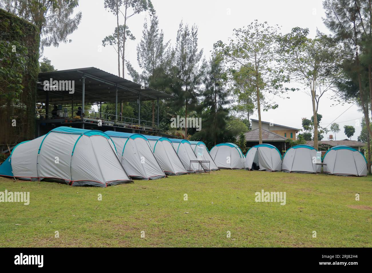 Camping and tent in the riverside. Panoramic landscape. Natural area ...
