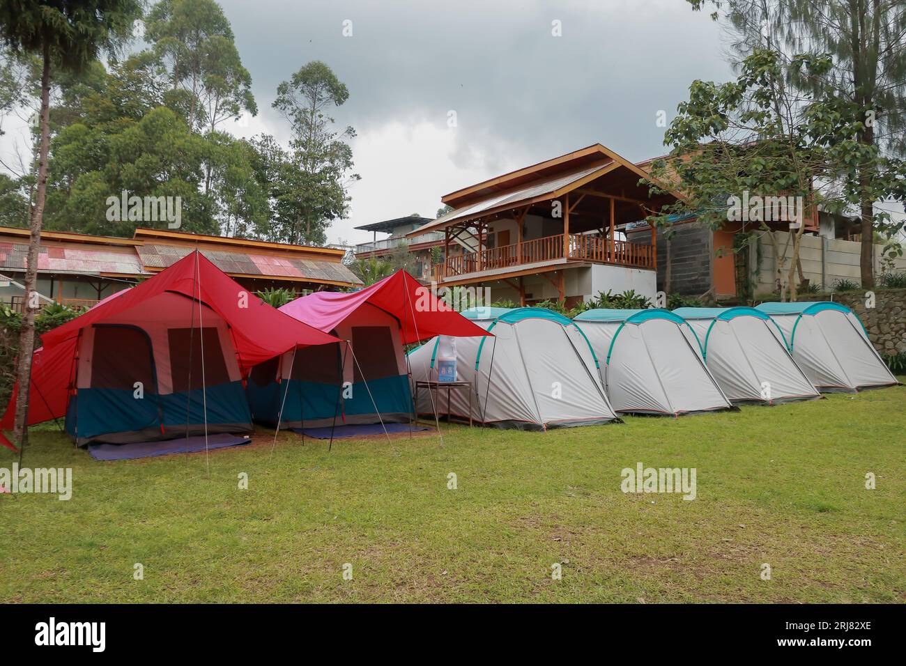 Camping and tent in the riverside. Panoramic landscape. Natural area ...