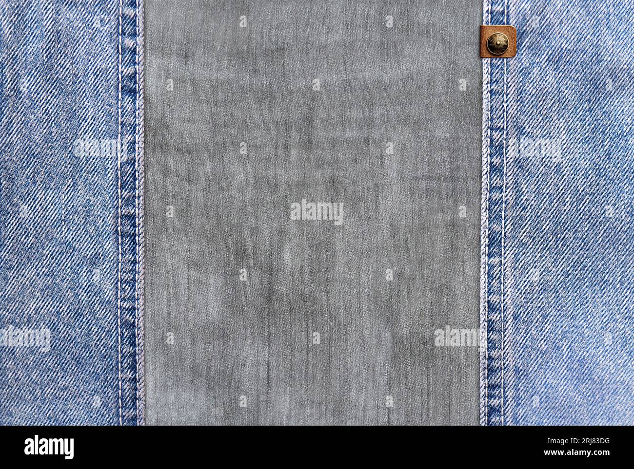 Horizontal background with blue denim borders with a seam, leather ...