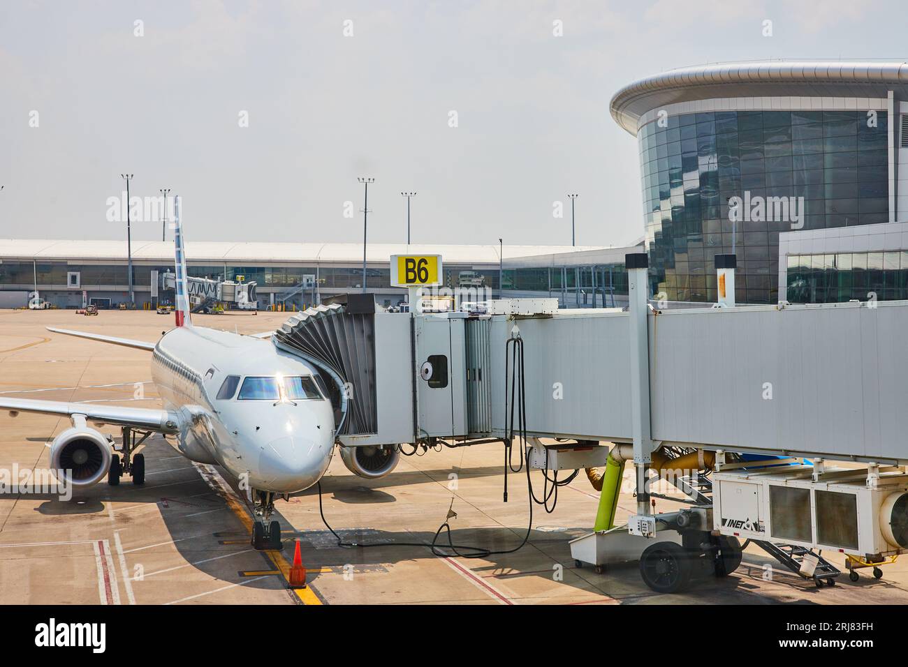 View of plane docked at airport terminal B6 with Indianapolis airport ...