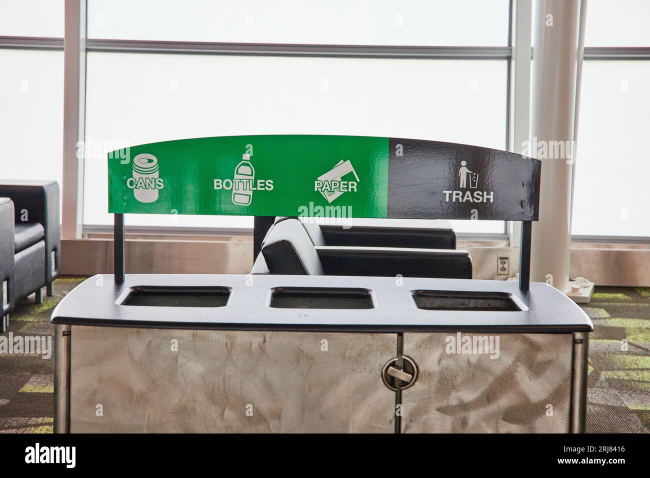 Recycling receptacle with trash section at airport terminal generic ...