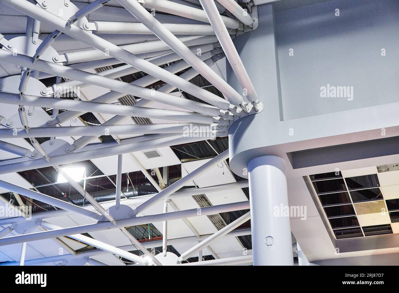 Pristine white ceiling with tons of white beams and missing ceiling ...
